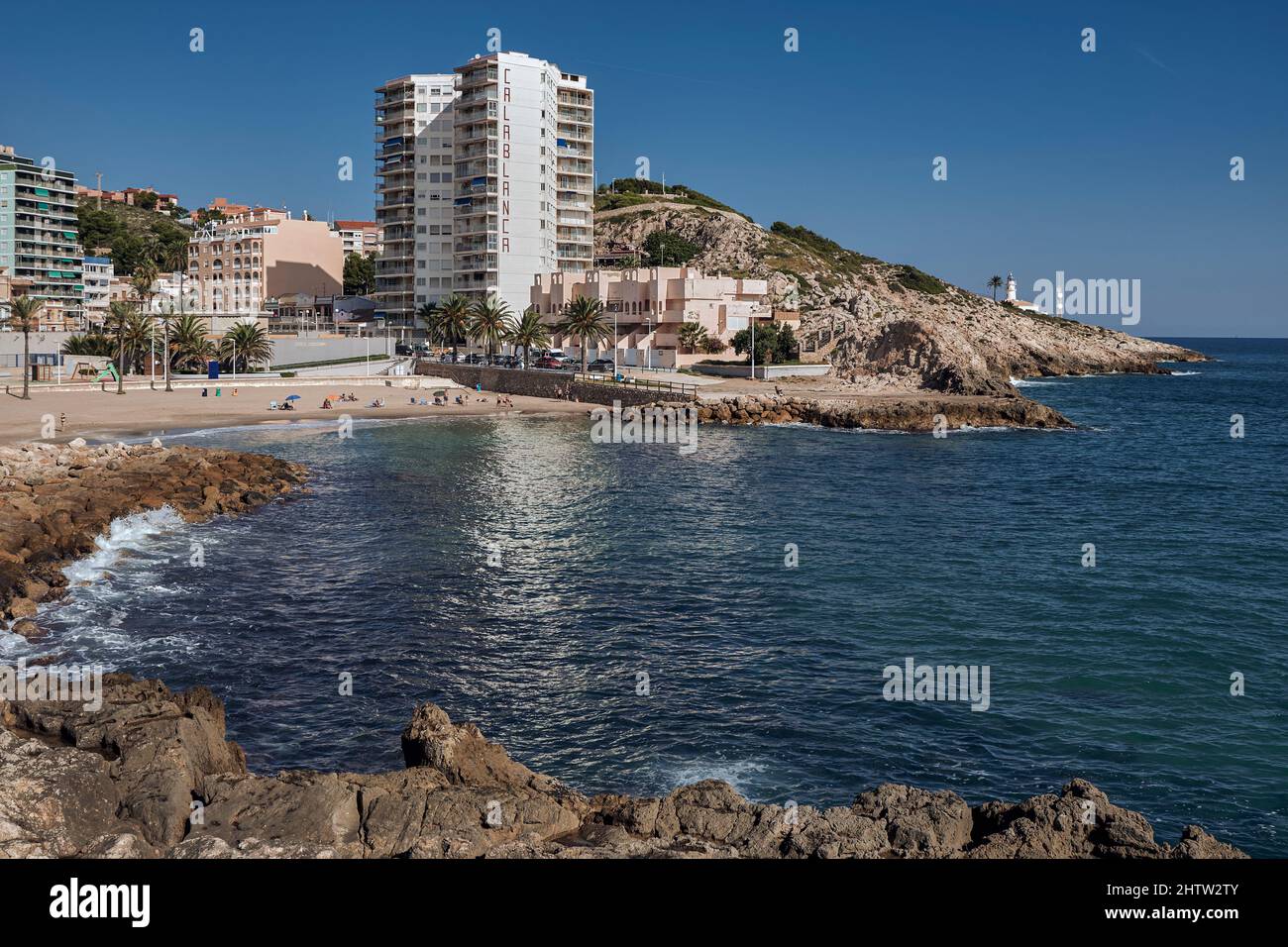 panoramic view of Playa de Cullera with the Cala Blanca building and ...