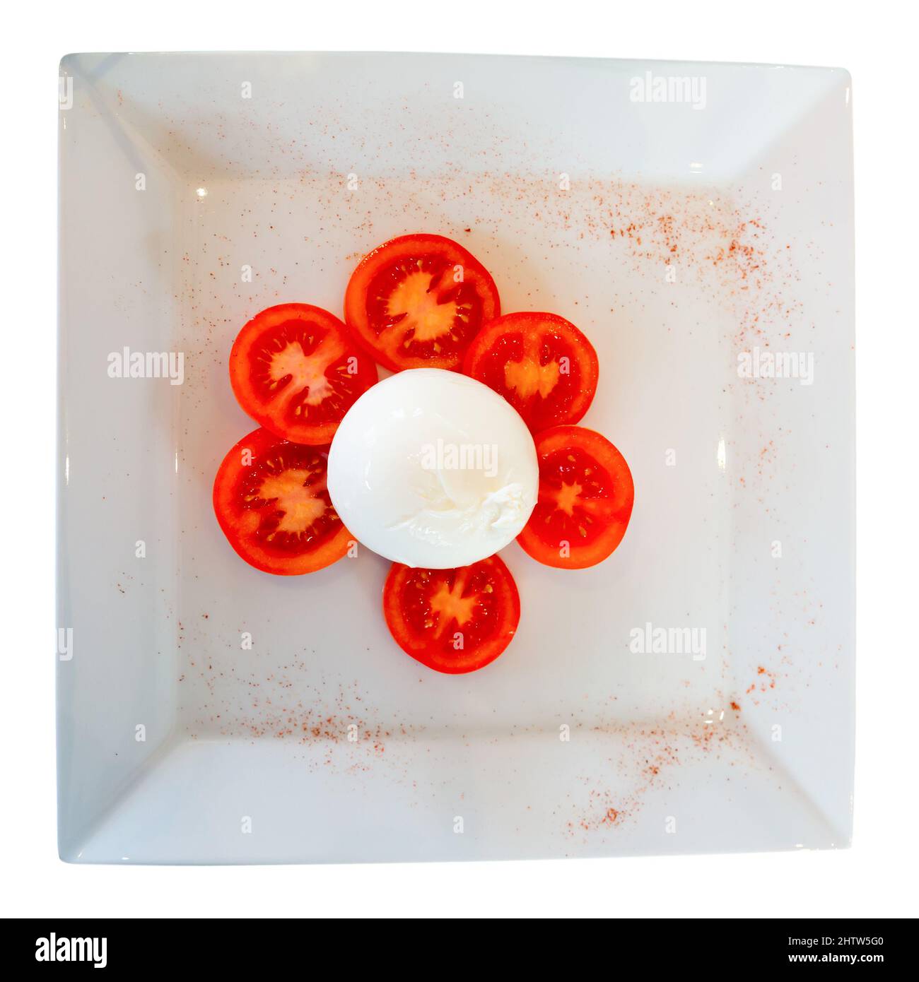 Italian snack Buratta with tomatoes Stock Photo - Alamy