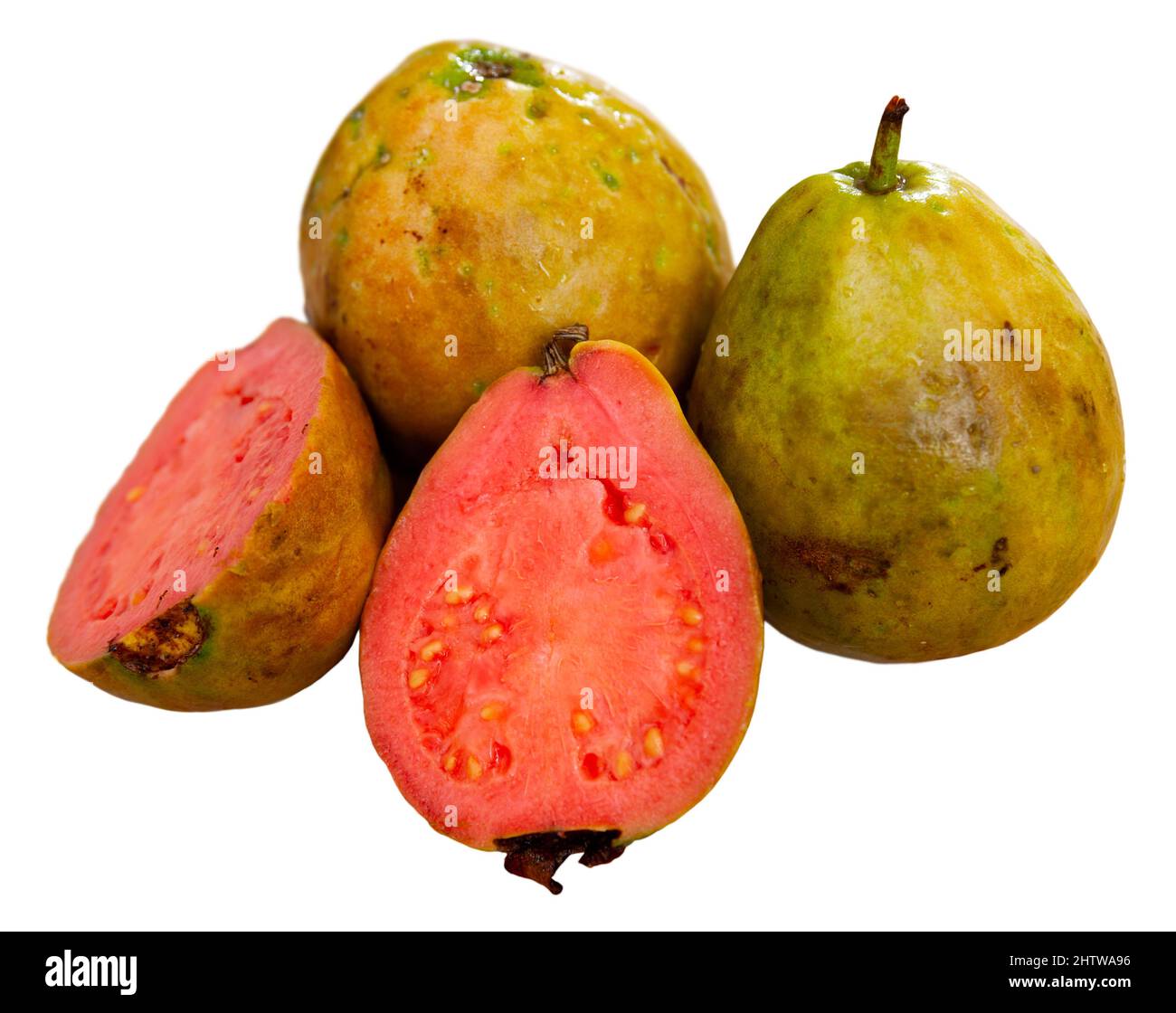 Fresh organic red guavas fruit cut in half on a wooden board. Exotic ...