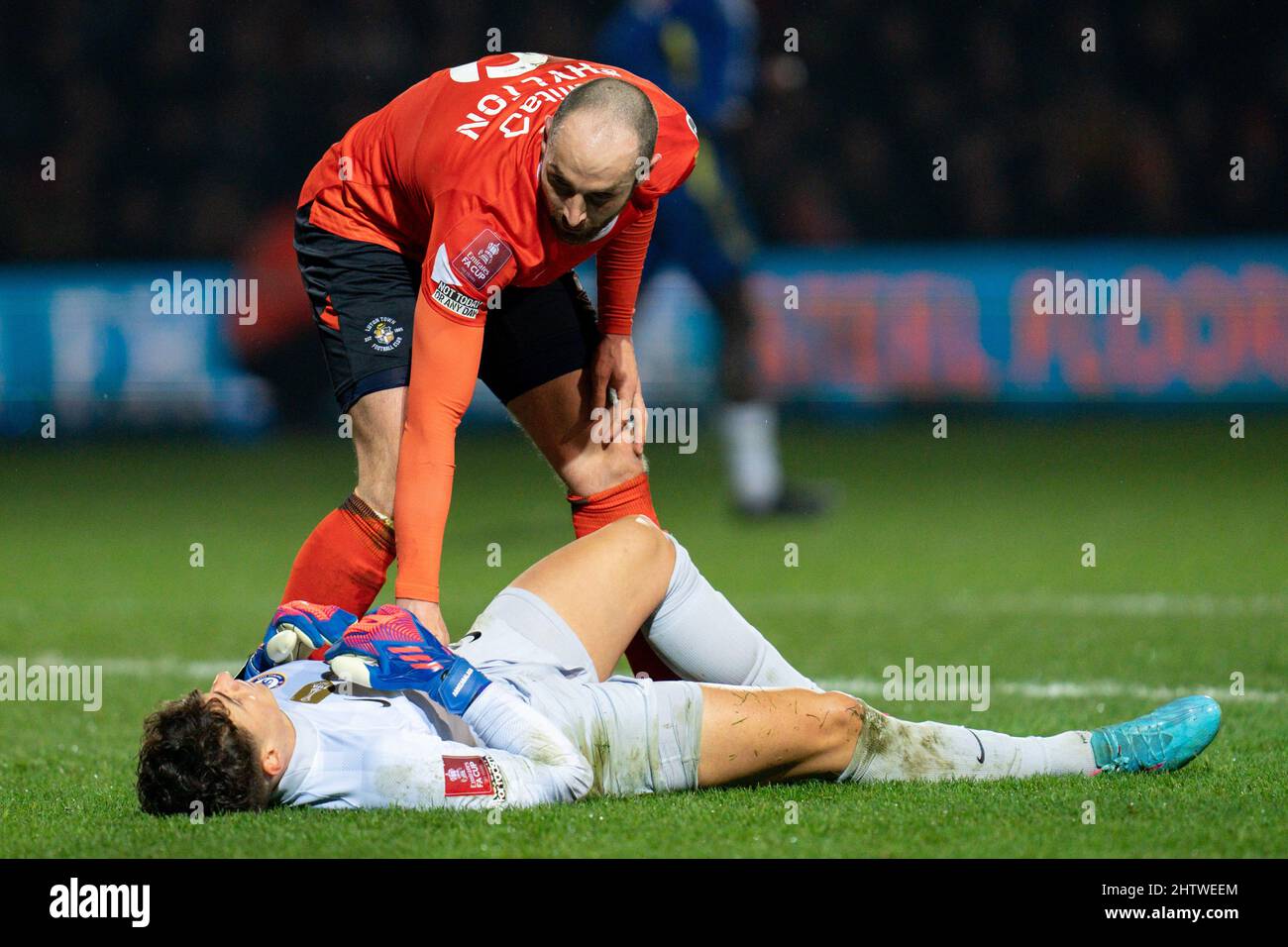 Danny Hylton #9 of Luton Town checks on Kepa Arrizabalaga #1 of Chelsea ...