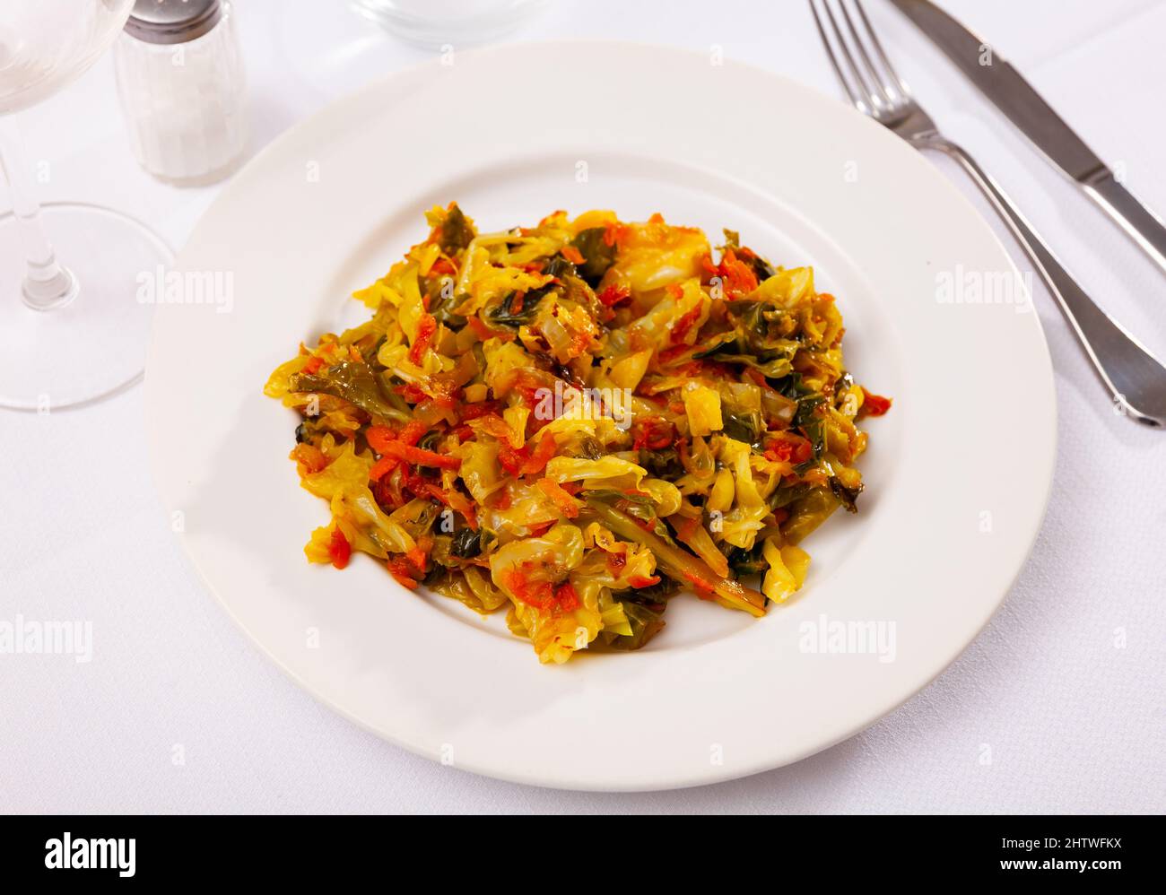 Spicy braised white cabbage as side dish or main course Stock Photo - Alamy
