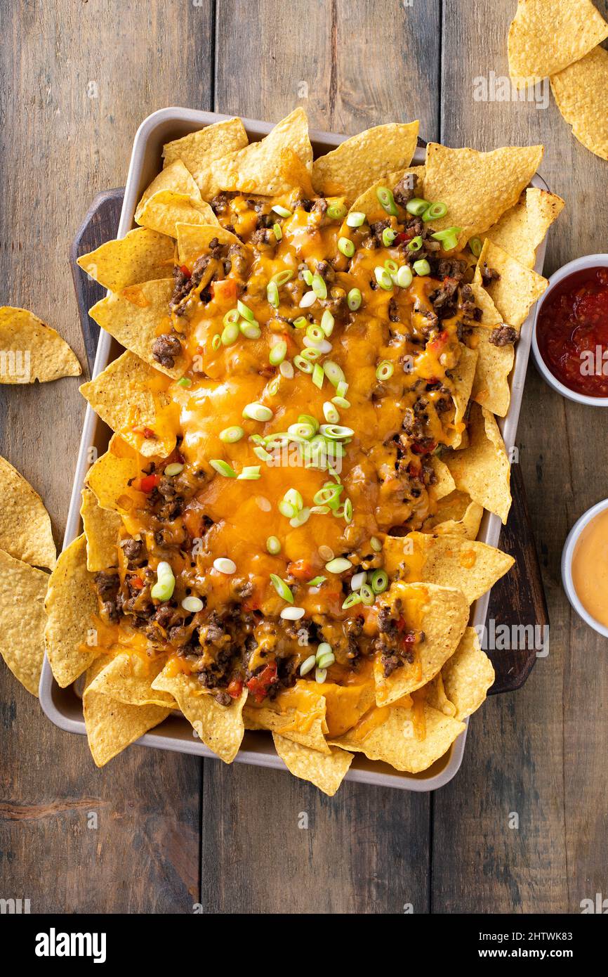 Traditional nachos with ground beef and red pepper Stock Photo - Alamy
