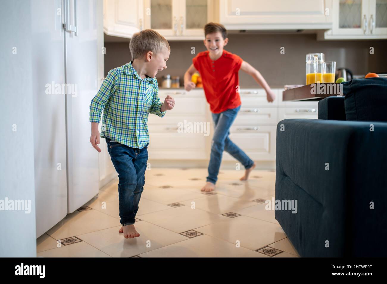 Two cute kids having fun at home Stock Photo - Alamy