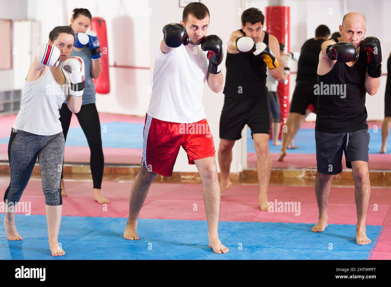 Group of people of different ages training Stock Photo - Alamy