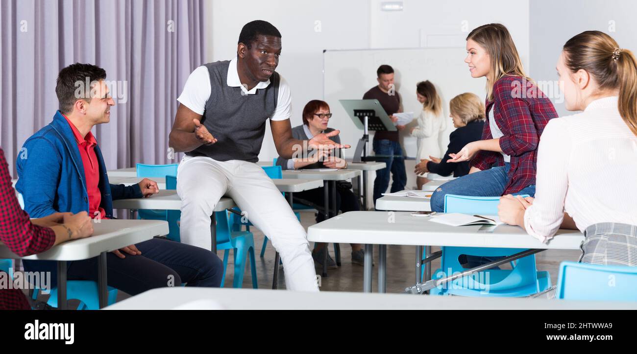 Students enjoying free time in class Stock Photo - Alamy