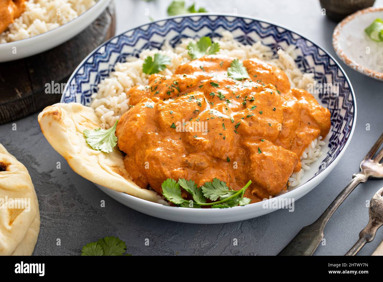 Chicken tikka masala, cooked marinated chicken in spiced curry sauce ...