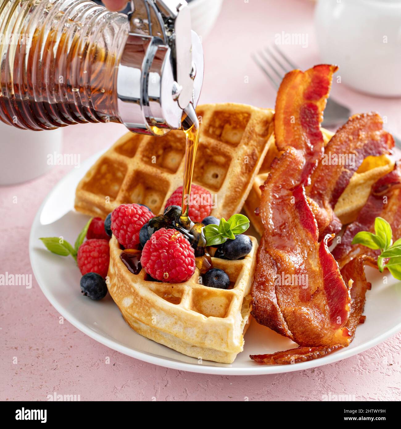 Belgian waffles with bacon and fresh berries for breakfast Stock Photo ...
