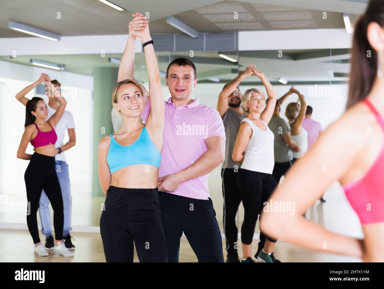 Young dancing pair dance together Stock Photo - Alamy