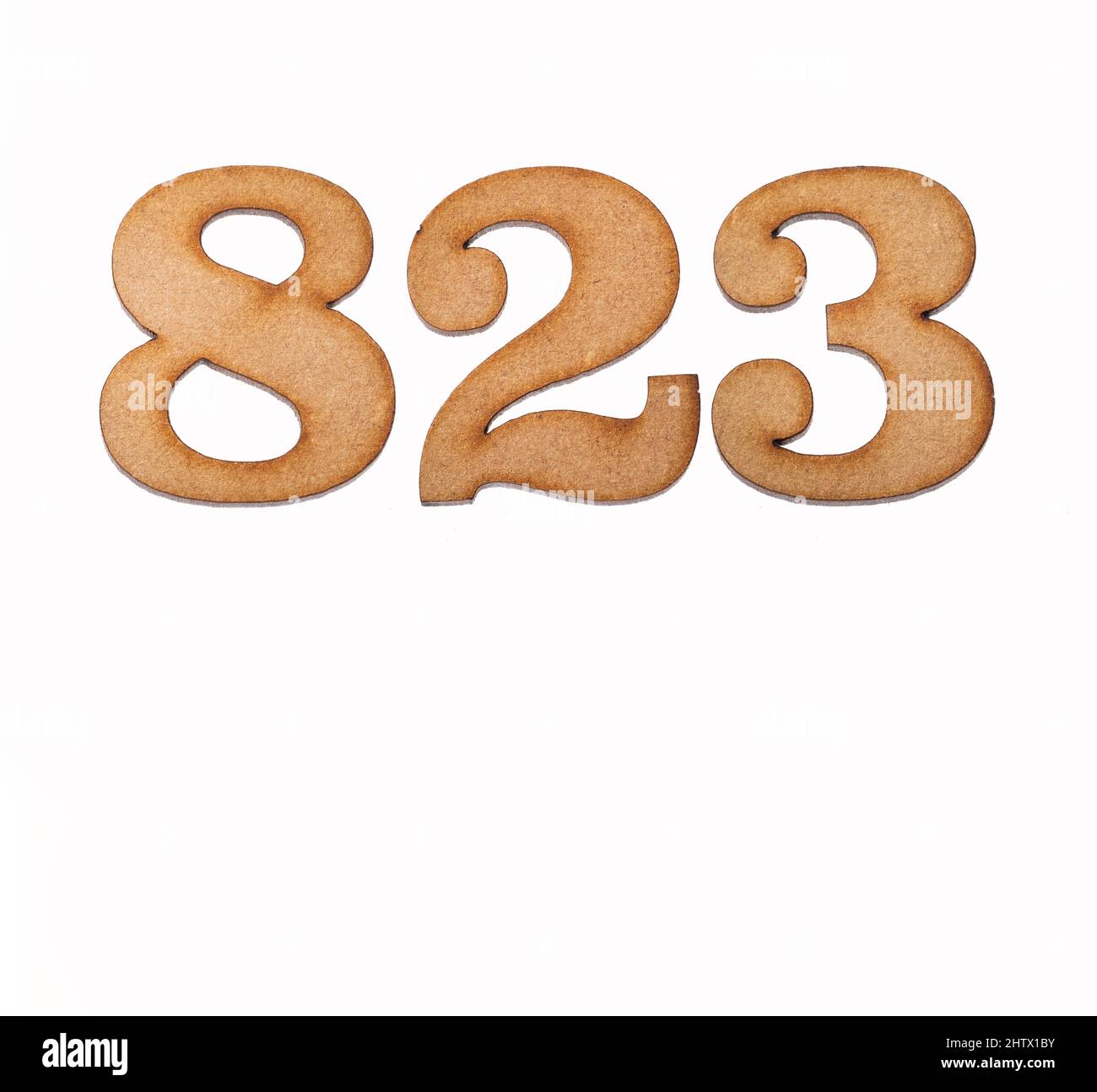 Number 823 in wood, isolated on white background Stock Photo - Alamy