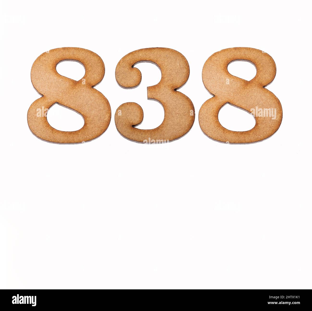 Number 838 - Piece of wood isolated on white background Stock Photo - Alamy