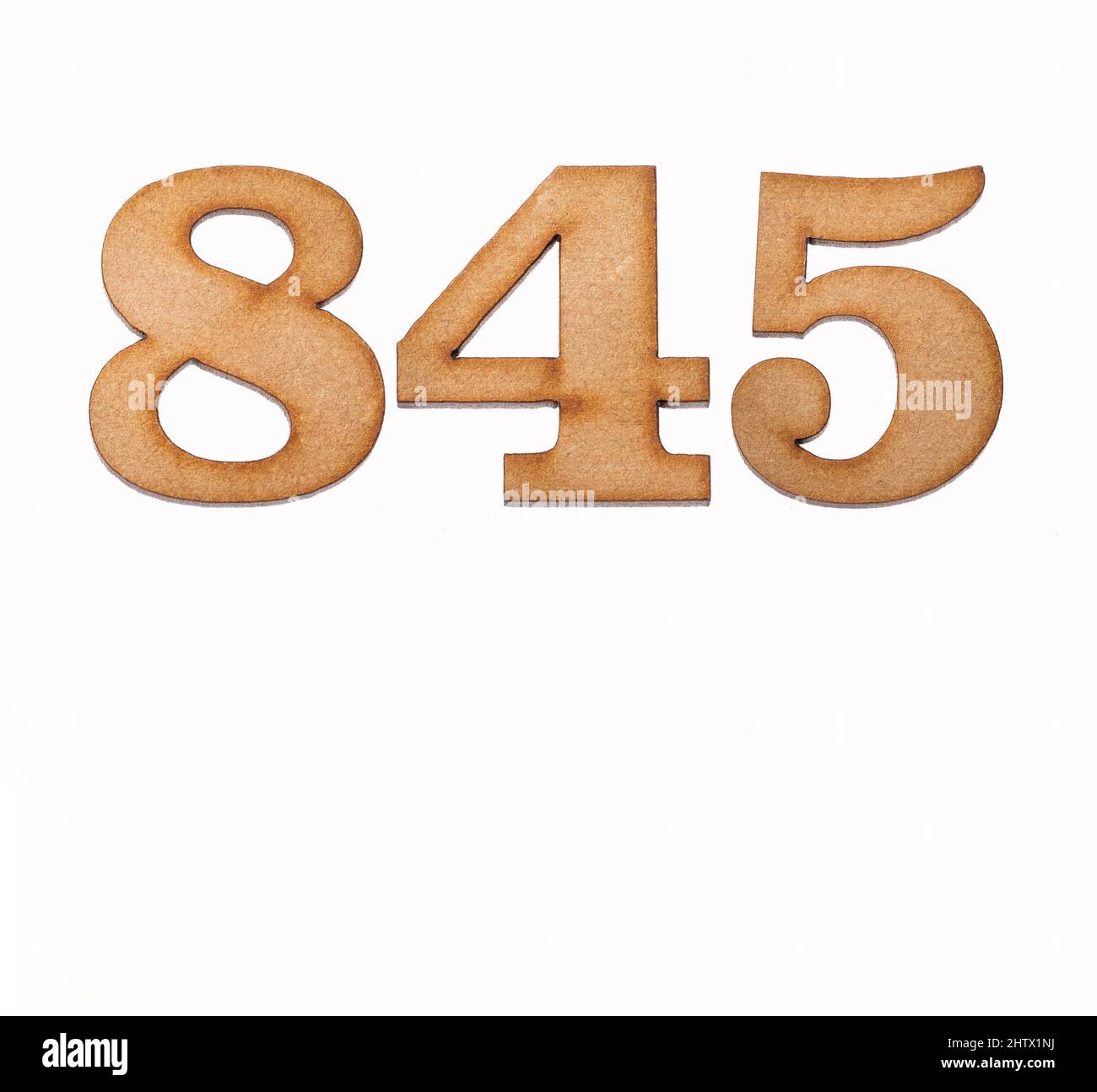 Number 845 in wood, isolated on white background Stock Photo - Alamy