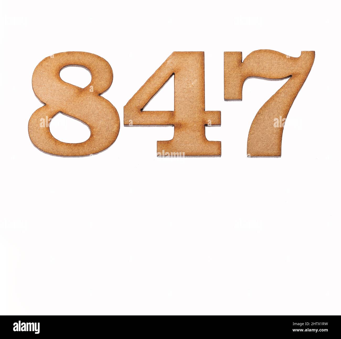 Number 847 in wood, isolated on white background Stock Photo - Alamy