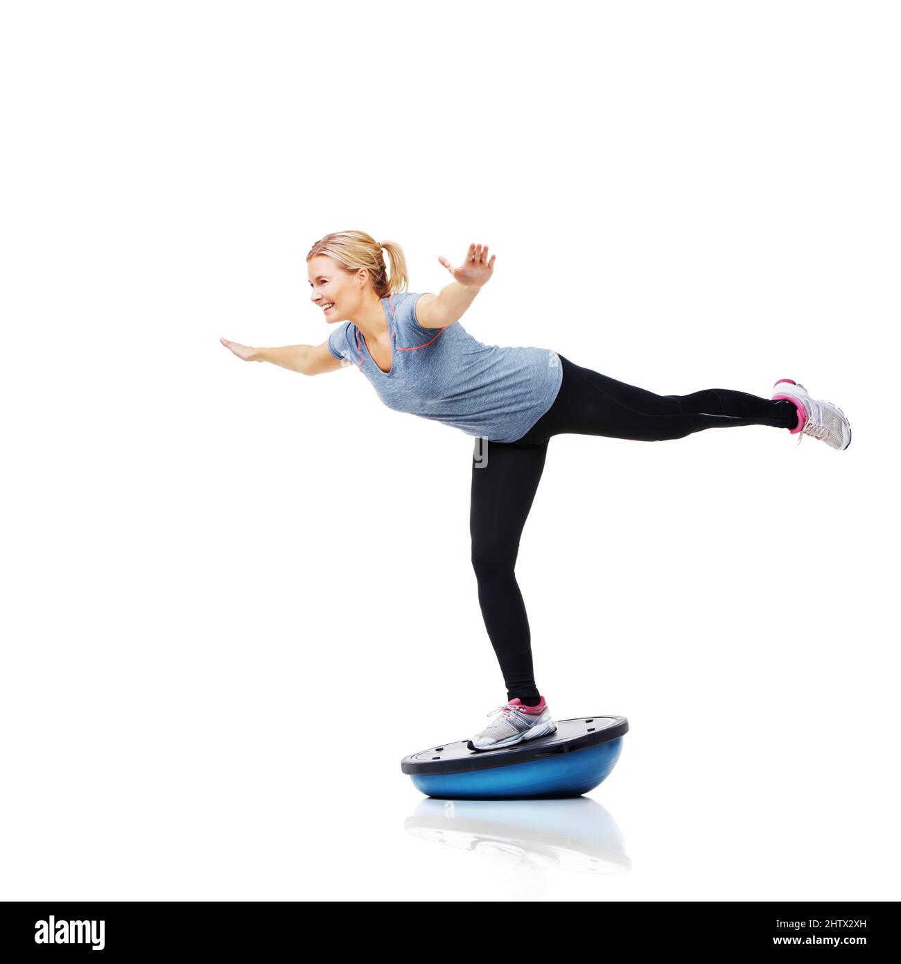 Enjoying a full-body workout. An attractive young woman working her ...