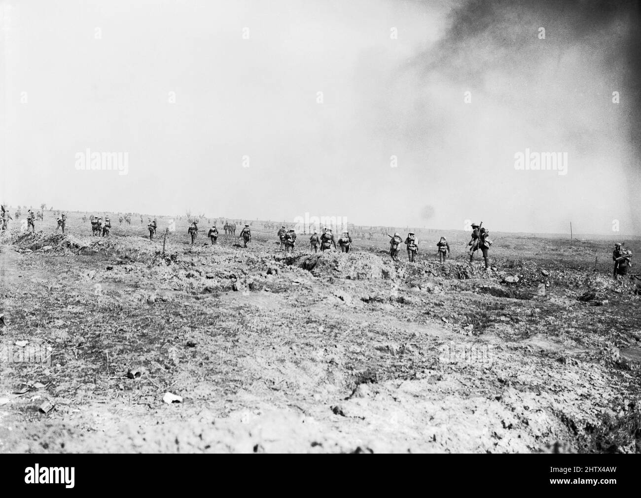 British supporting troops move up in single file to support the attack ...