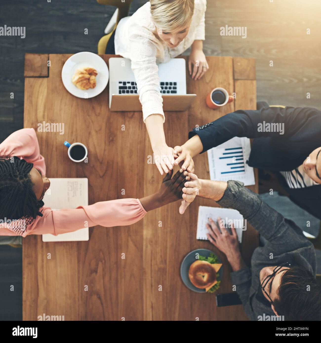 Determined to reach their goals together. High angle shot of a group of ...