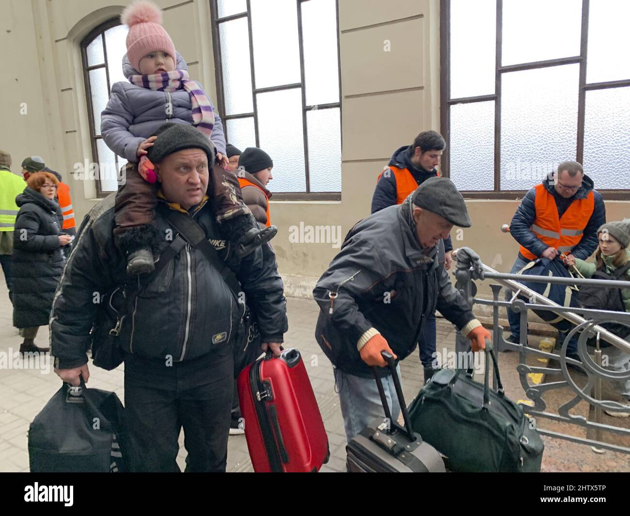 People fleeing war-torn Ukraine amid Russia's invasion arrive at a ...