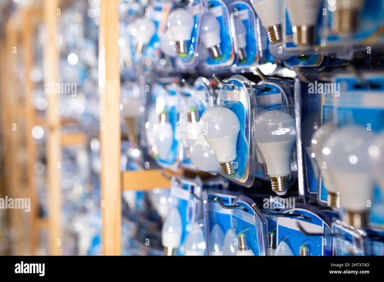 Light bulbs on display stand in household goods store Stock Photo - Alamy