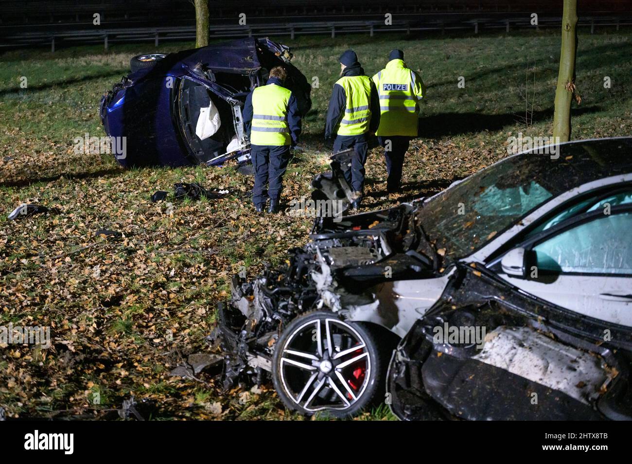 Hamburg, Germany. 03rd Mar, 2022. Police officers inspect the wreckage ...