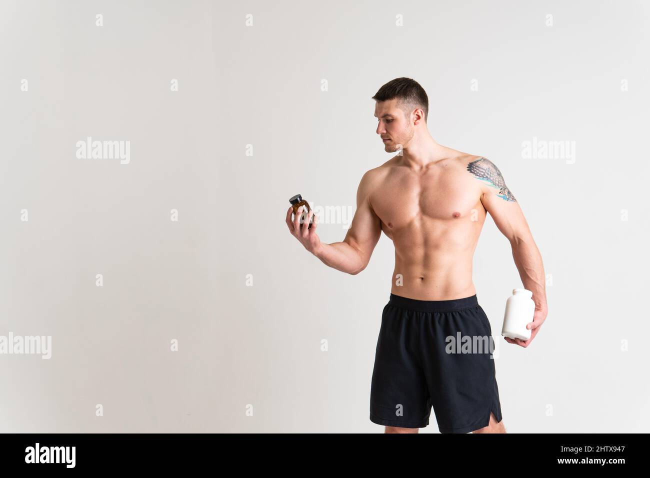 Fitness protein jars white on white background bodybuilder powder ...