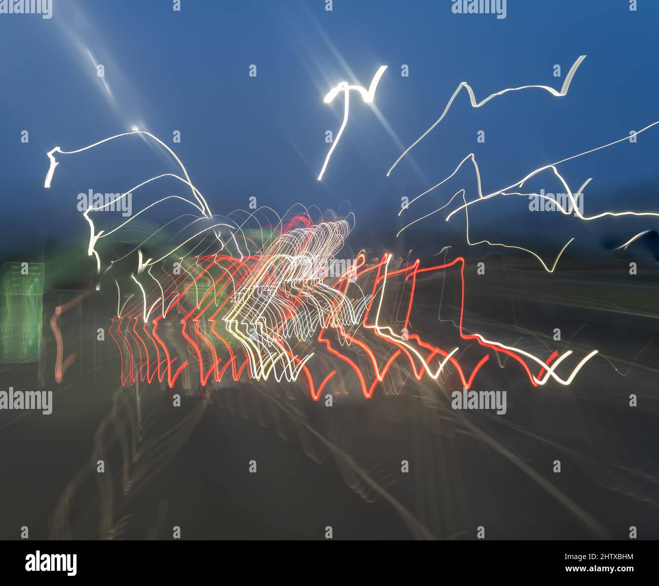 Abstract light trails road yellow hi-res stock photography and images ...