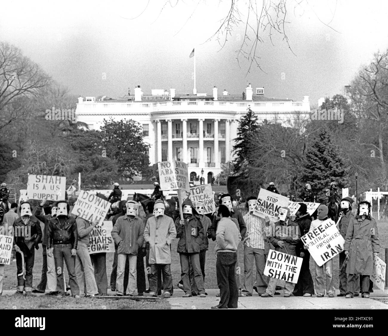 Demonstrators protesting the visit of Mohammad Reza Pahlavi, the Shah ...