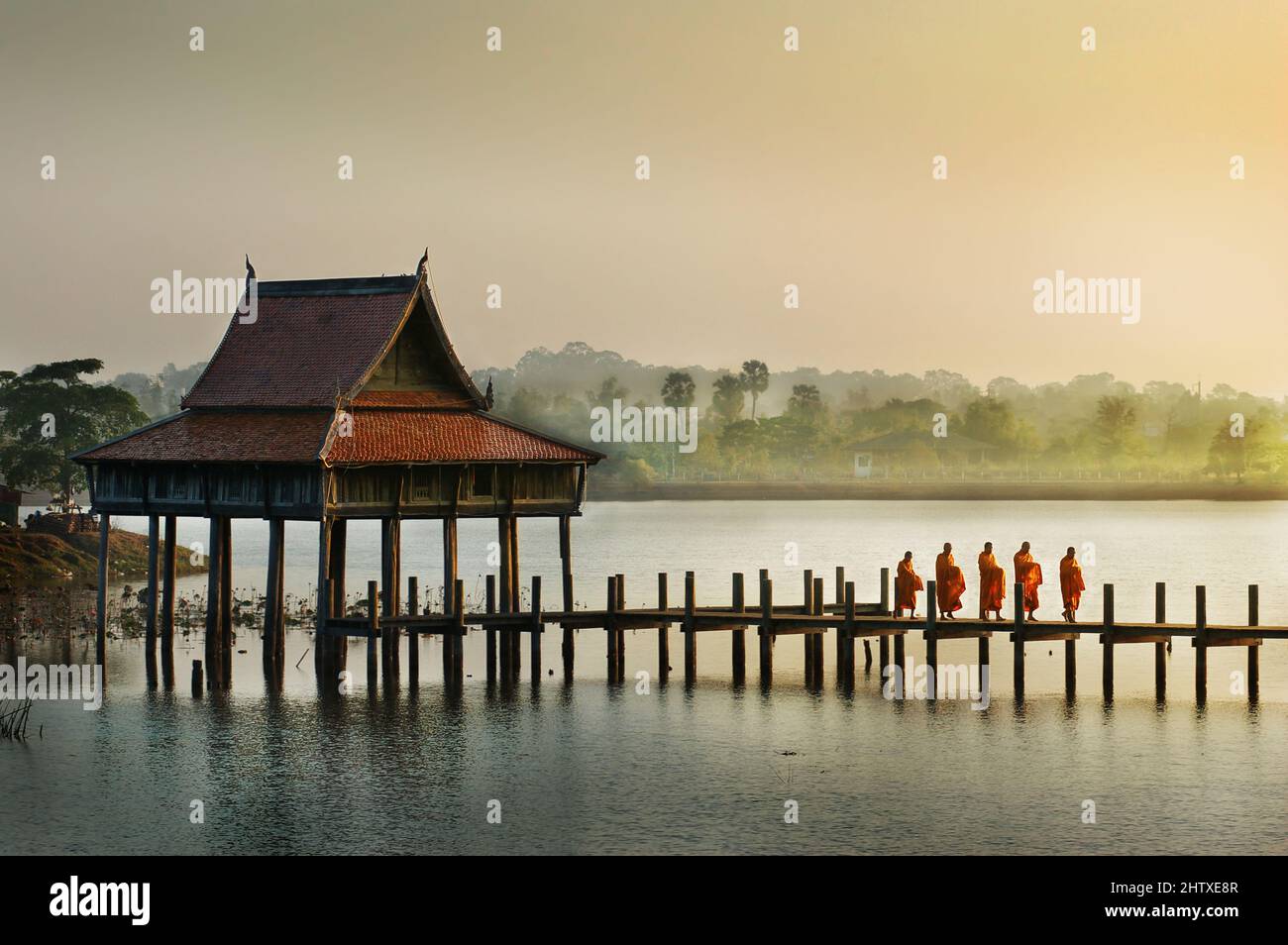 Historic wooden building in center of pool for keep ancient scriptures ...