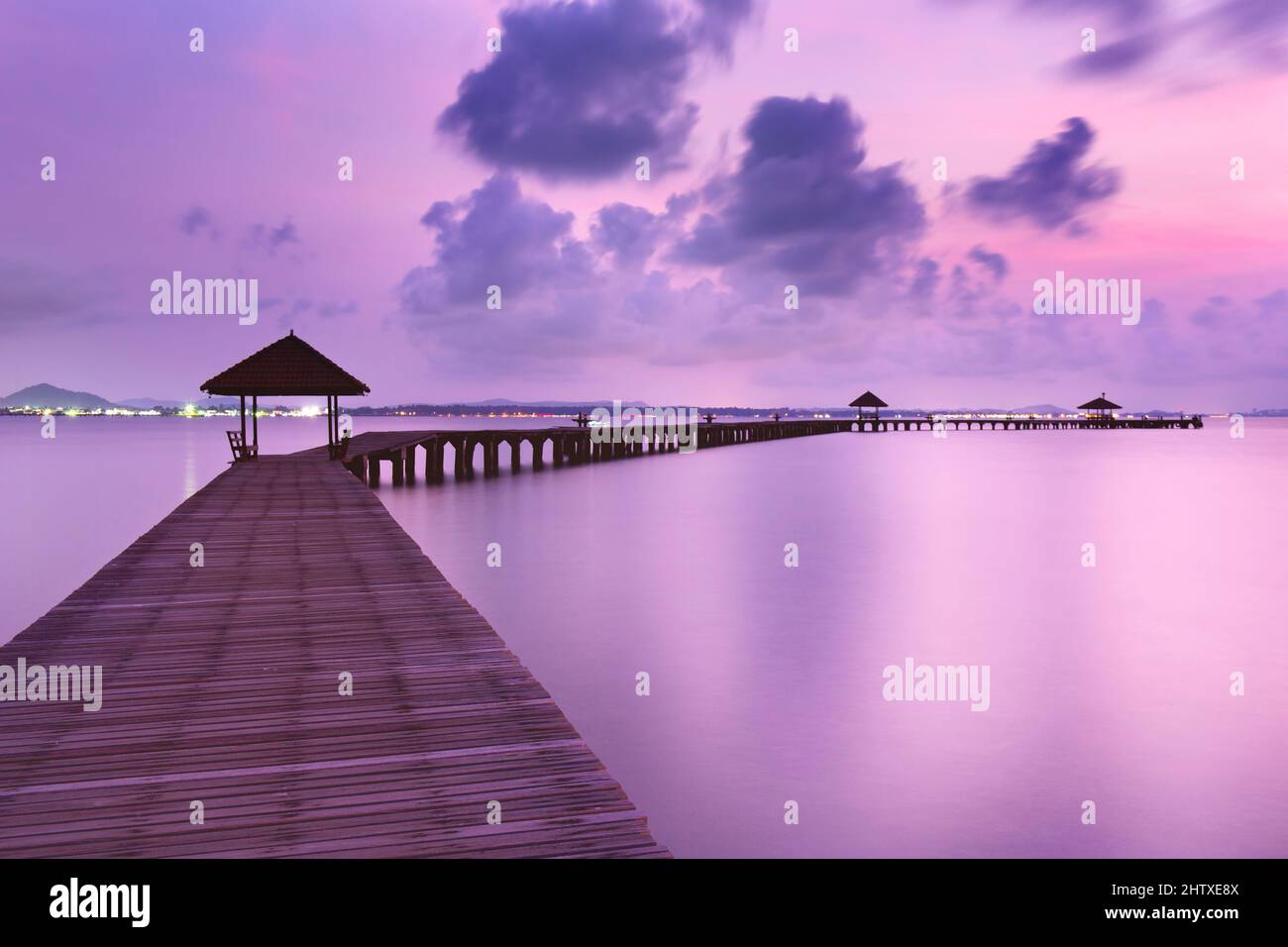Old wood bridge to sea Stock Photo - Alamy