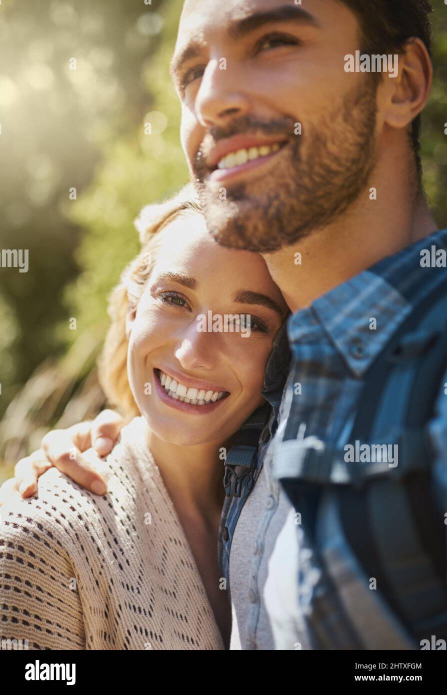 Being together makes perfect sense. Shot of a happy young couple ...