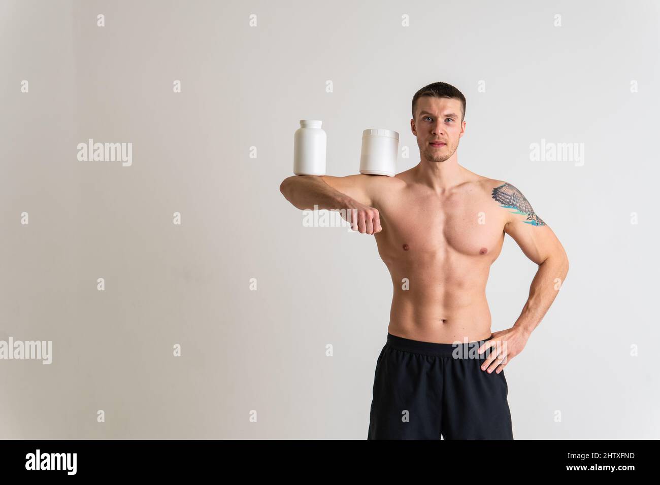 Fitness protein jars white on white background bodybuilder powder ...