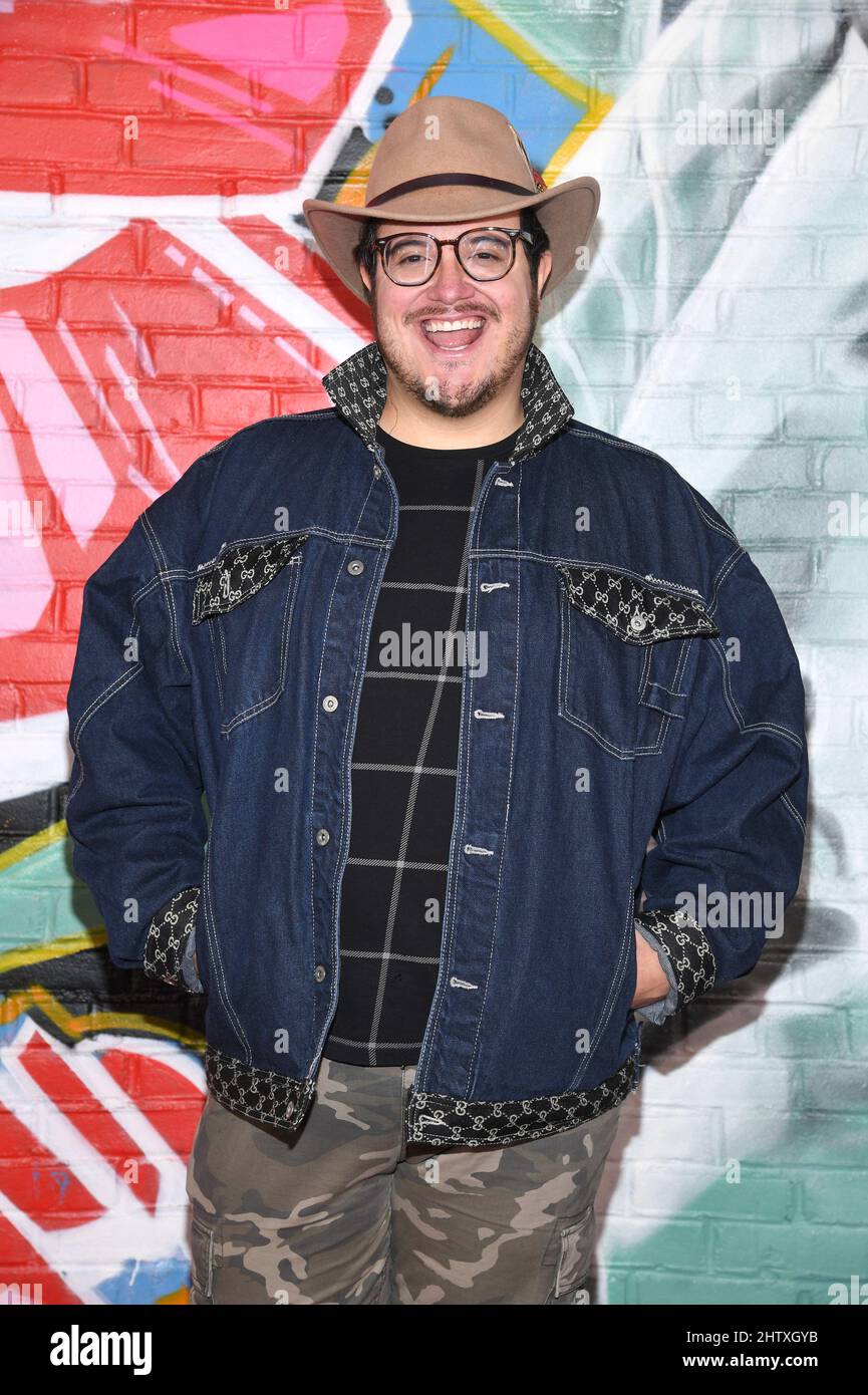 Jonathan Valdez attends the red carpet for the grand opening ...