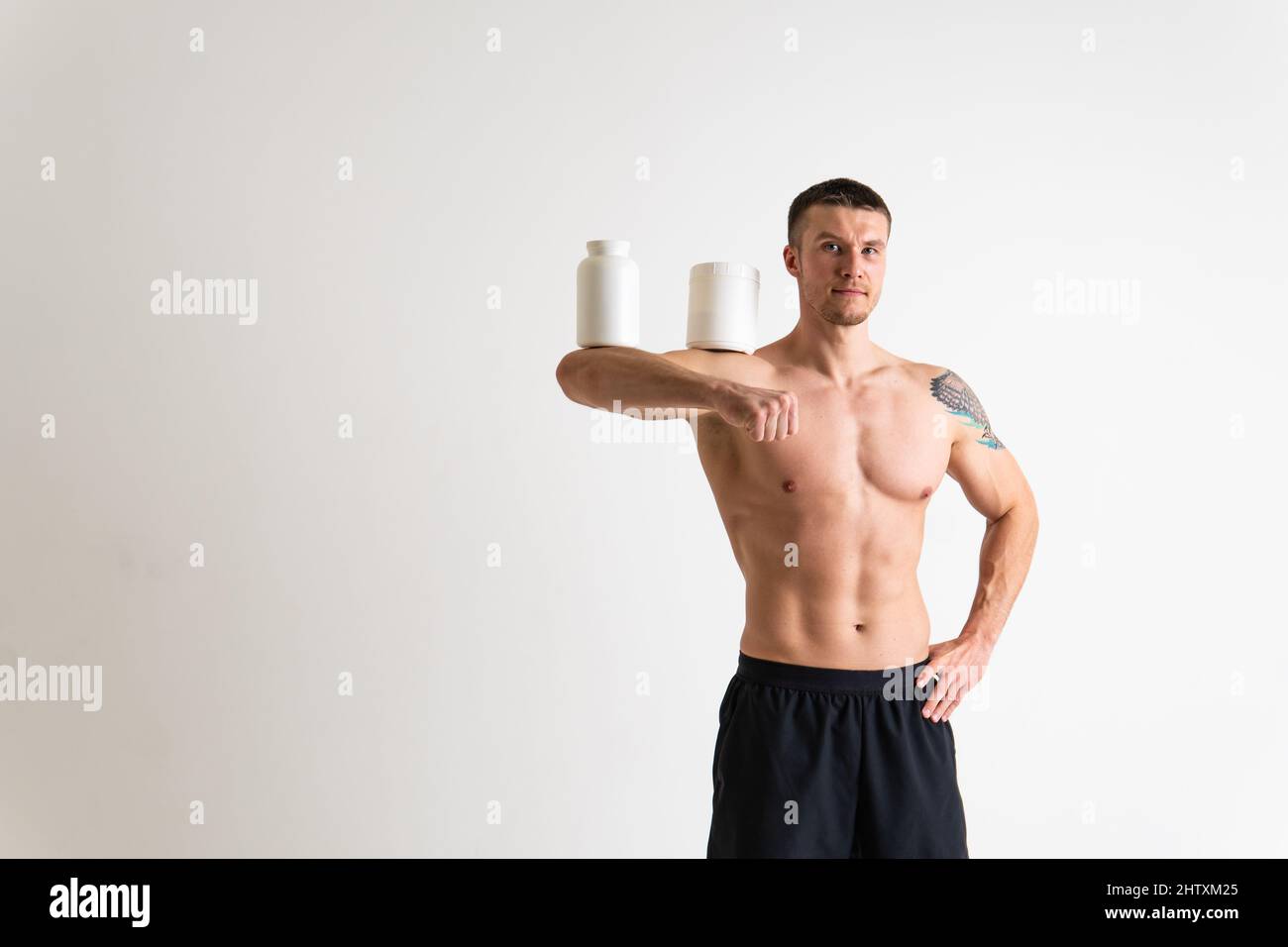 Fitness protein jars white on white background bodybuilder powder ...