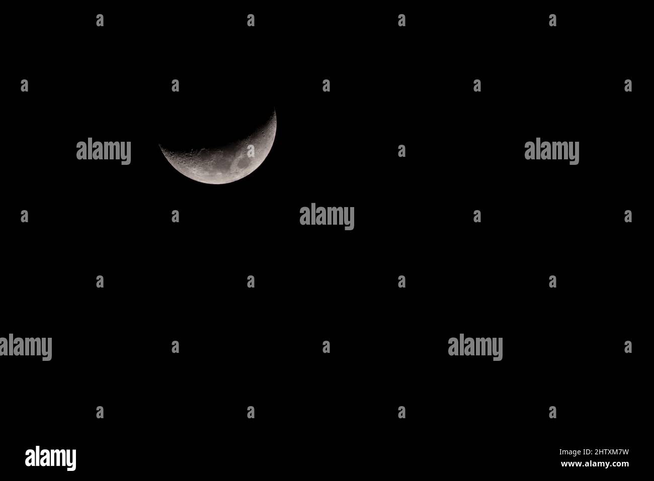 Crescent moon in the dark night sky. High resolution photo Stock Photo ...