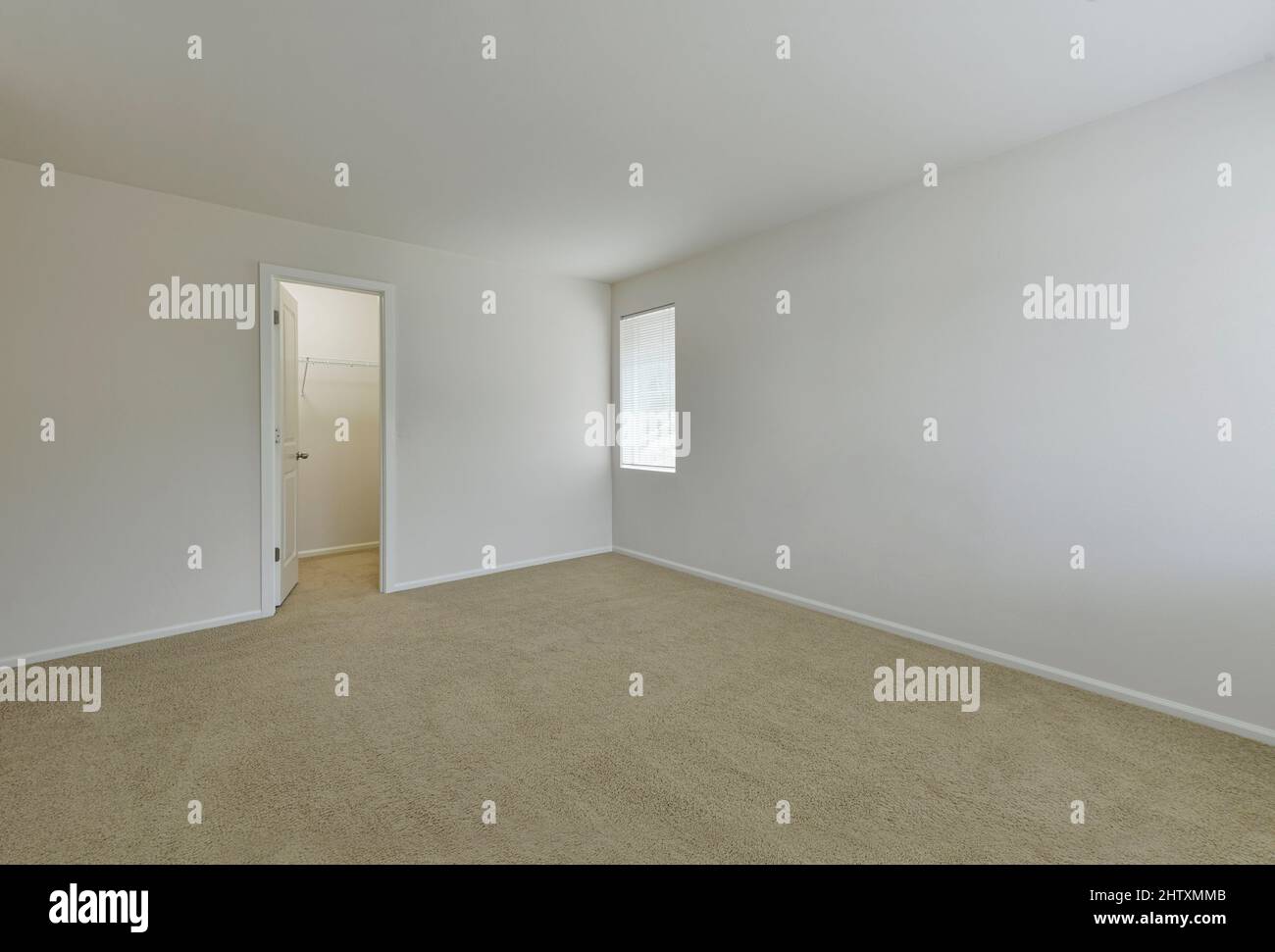 Modern residential empty bedroom interior Stock Photo - Alamy