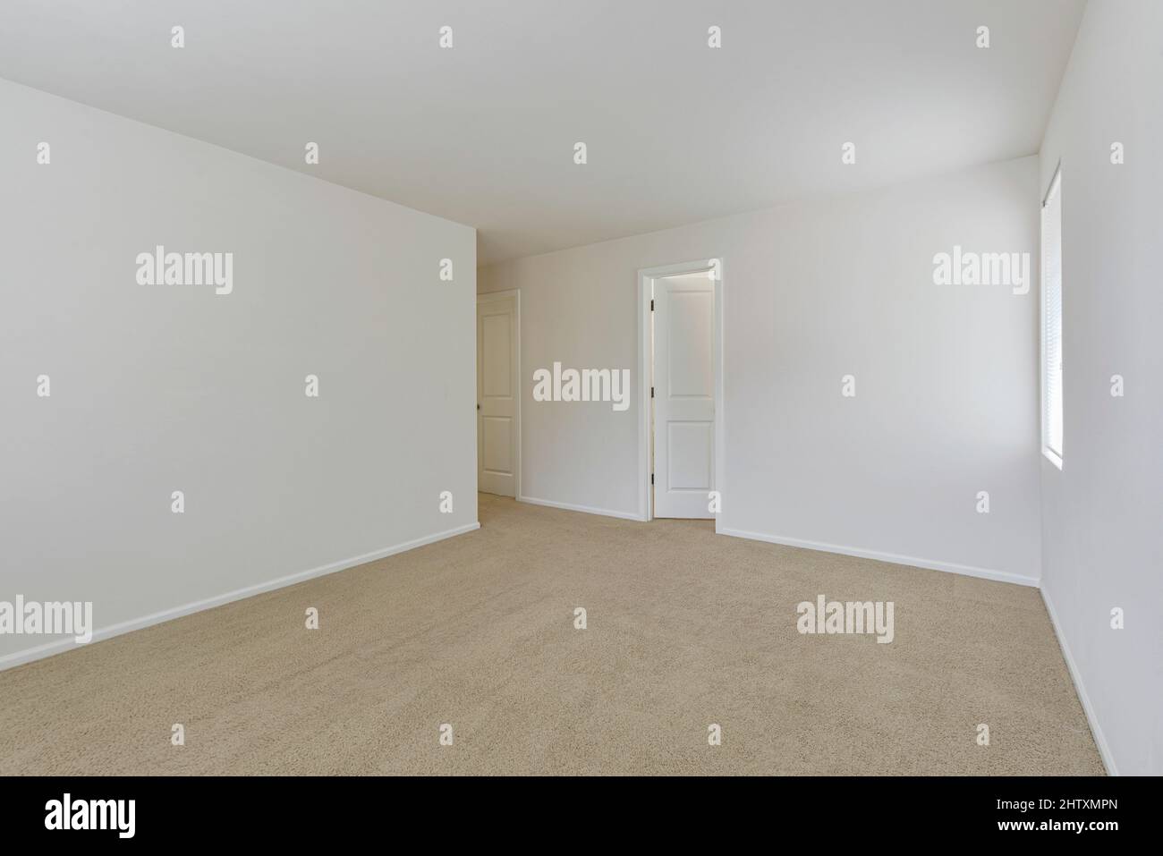 Modern residential empty bedroom interior Stock Photo - Alamy