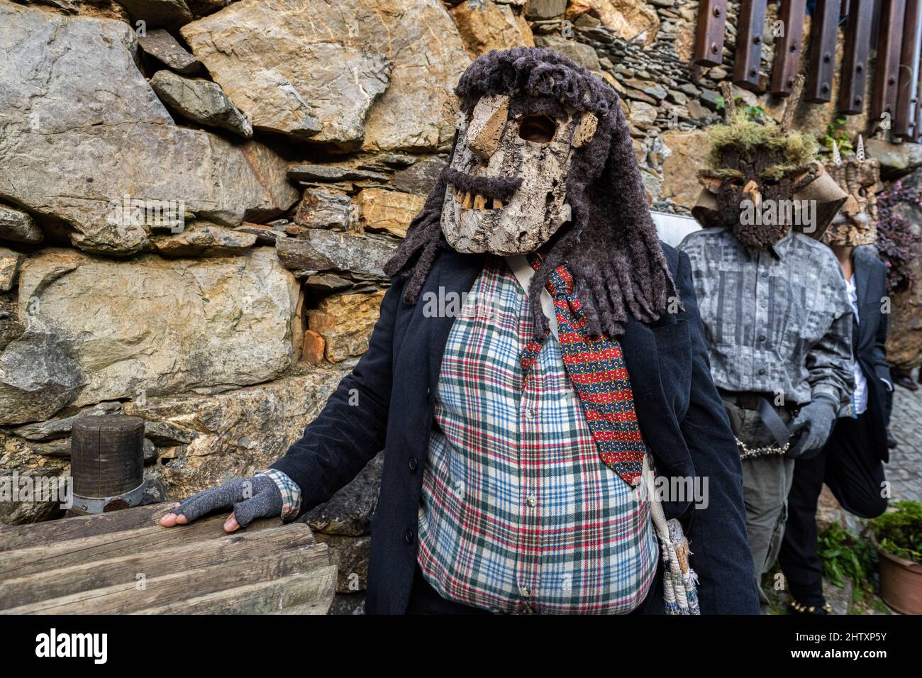 Gois, Portugal. 27th Feb, 2022. Revelers seen wearing cork masks during ...