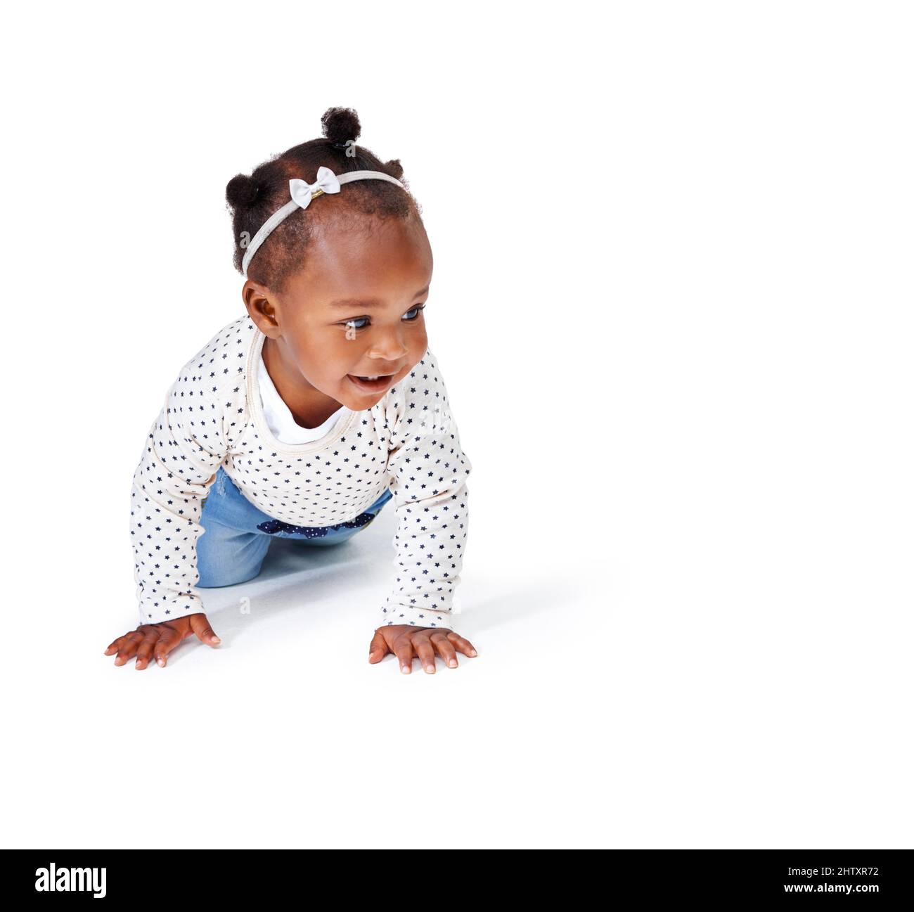 Time for some treasure hunting. Studio shot of an adorable baby girl ...