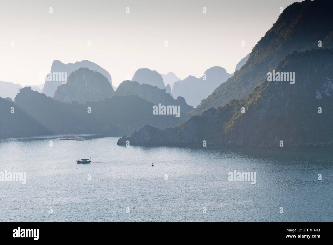 Fishing boat in Halong Bay, Gulf of Tonkin, Vietnam Stock Photo - Alamy