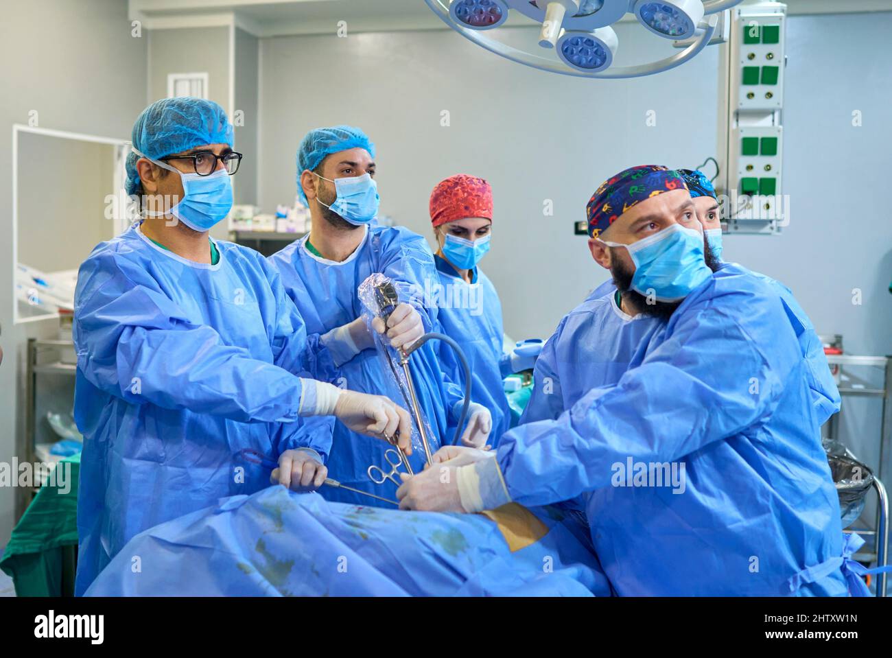 Group doctors perform operation patient hi-res stock photography and ...