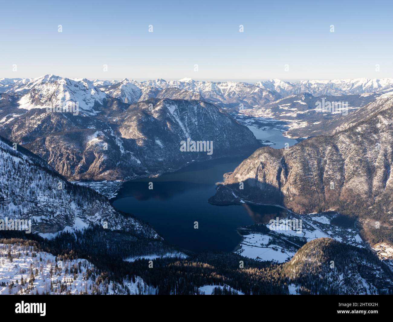 Blue sky over winter landscape, snow-covered mountain peaks, view from ...