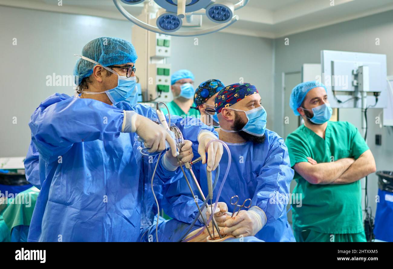 Group doctors perform operation patient hi-res stock photography and ...