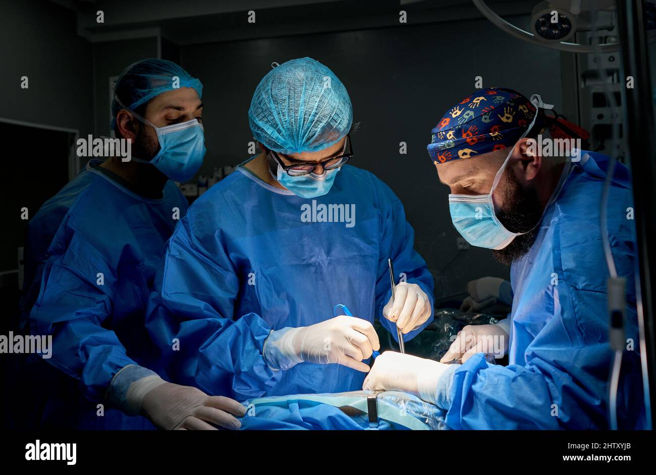 Group doctors perform operation patient hi-res stock photography and ...