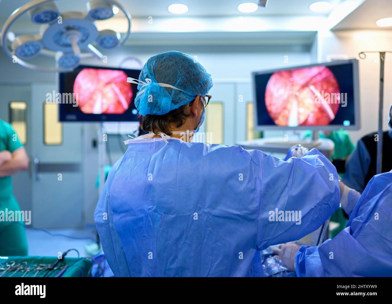 doctors in the operating room perform surgery on a patient Stock Photo ...