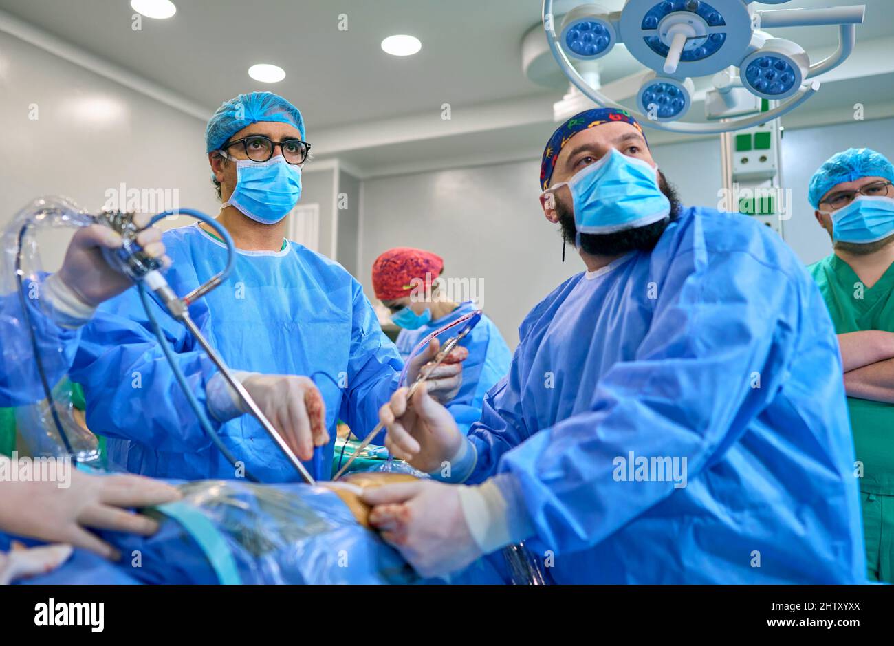 Group doctors perform operation patient hi-res stock photography and ...