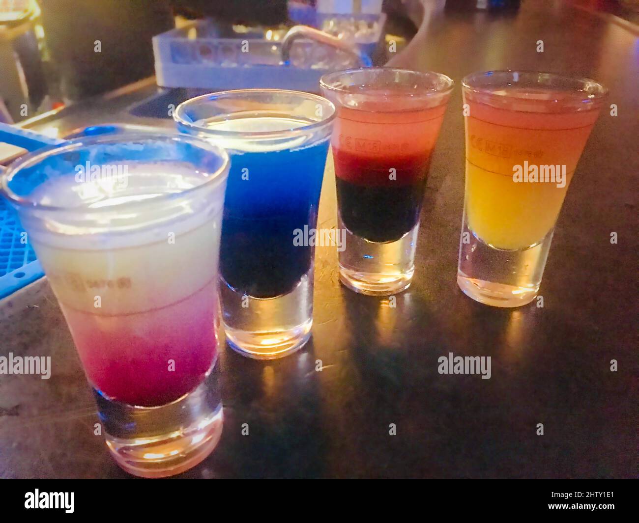 Colorful drinks, shots at a bar, colorful alcohol Stock Photo - Alamy
