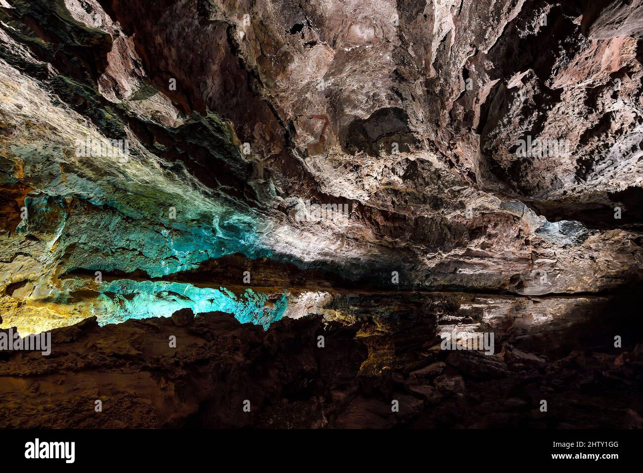 Colourfully illuminated areas of the Cueva de los Verdes, Lanzarote ...