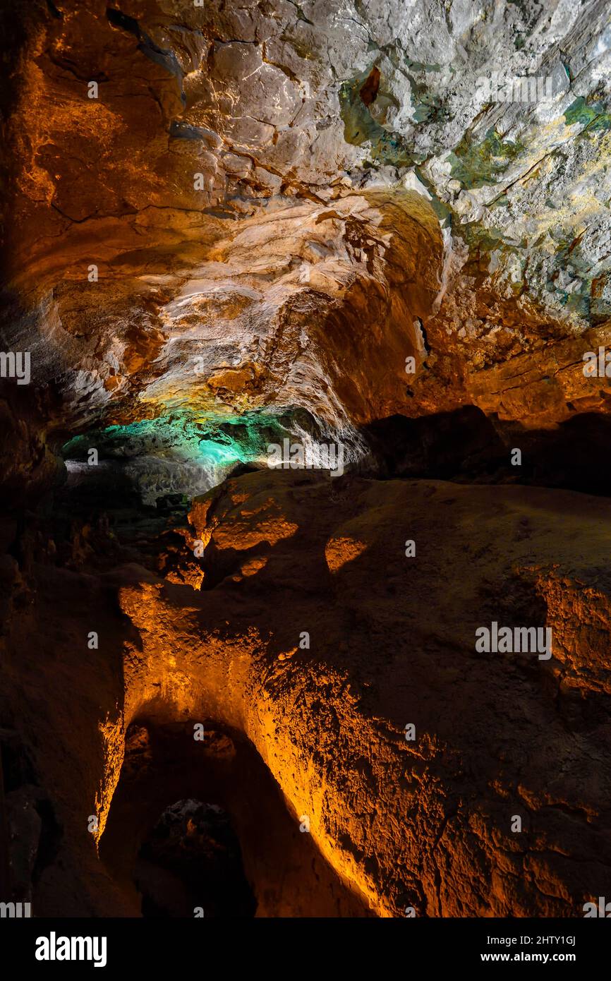 Colourfully illuminated areas of the Cueva de los Verdes, Lanzarote ...