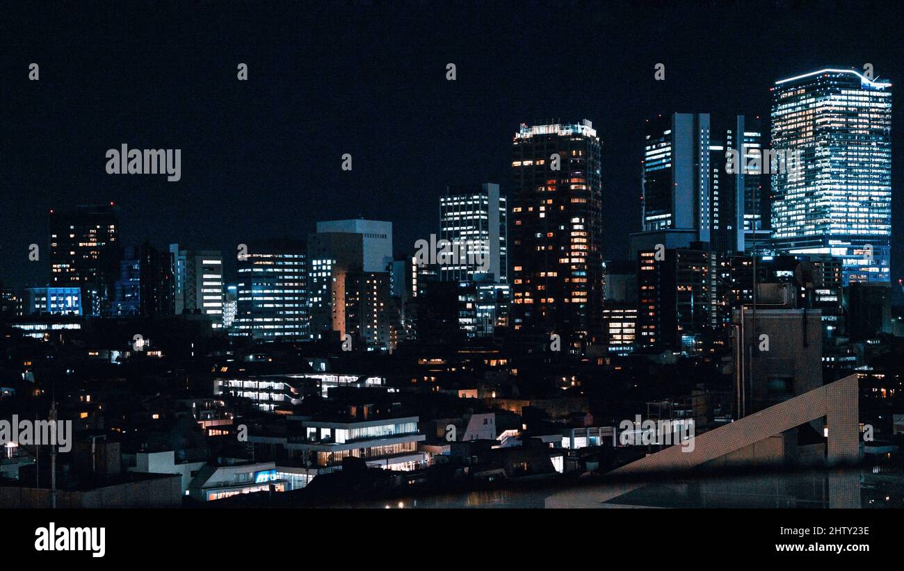 Night cityscape of modern buildings in Tokyo, Japan Stock Photo - Alamy
