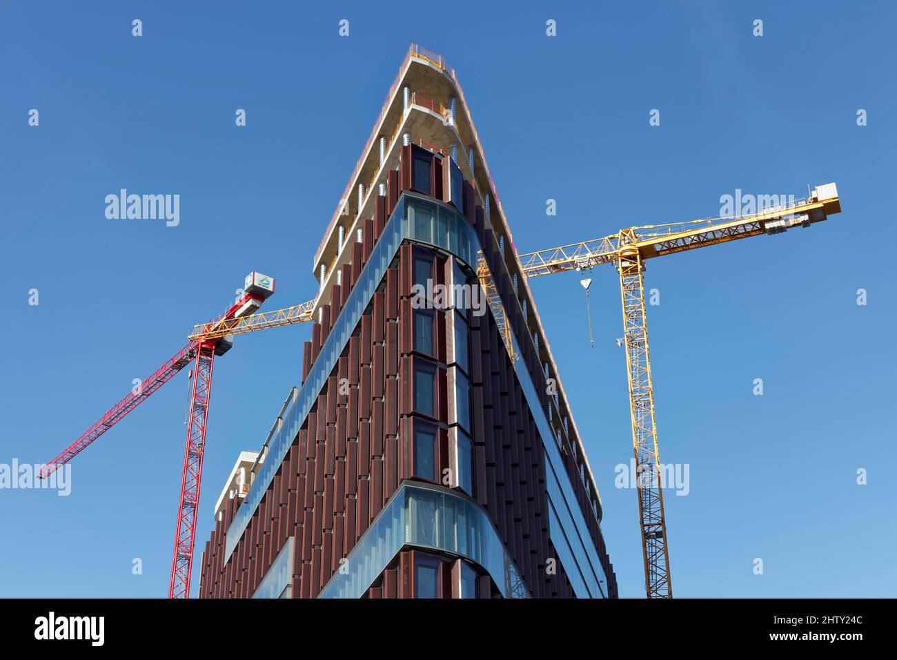 Modern high-end office tower Eclipse, construction site with ...