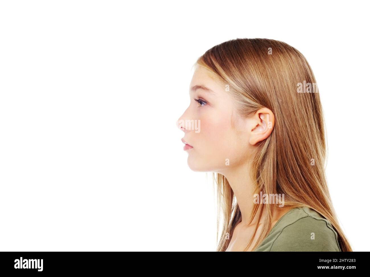 Looking ahead to a bright future. Profile of a gorgeous teenager Stock ...