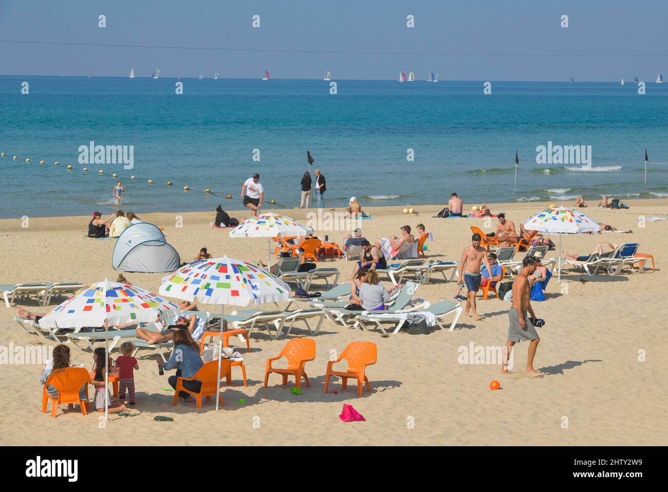 Sandy beach with people hi-res stock photography and images - Alamy